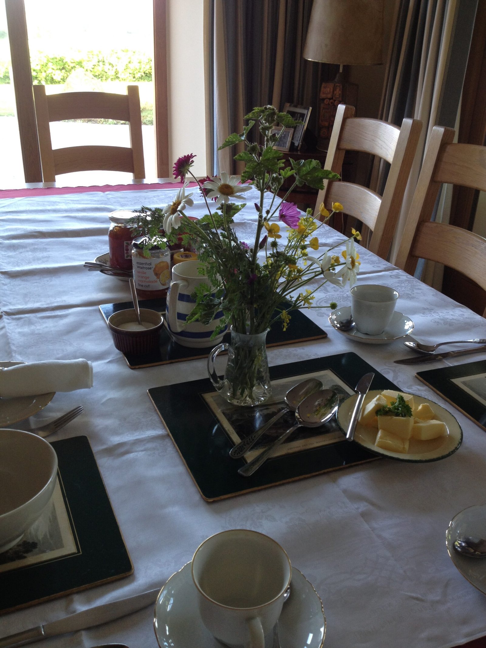 Oxeye daisies on the breakfast table | Graston Farm Self Catering Cottages